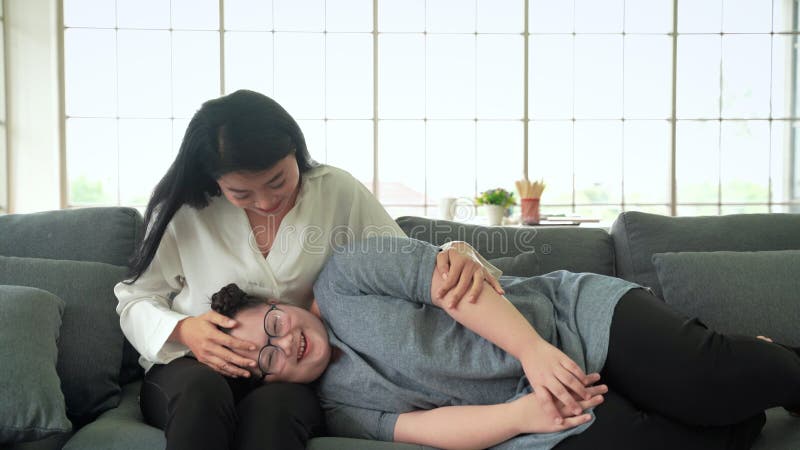 While The Mother Was Sitting Working With The Computer Down`s Syndrome