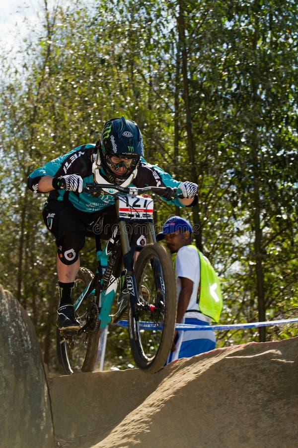 Downhill Rider Focused Over Rock Obstacle Editorial Photography - Image ...
