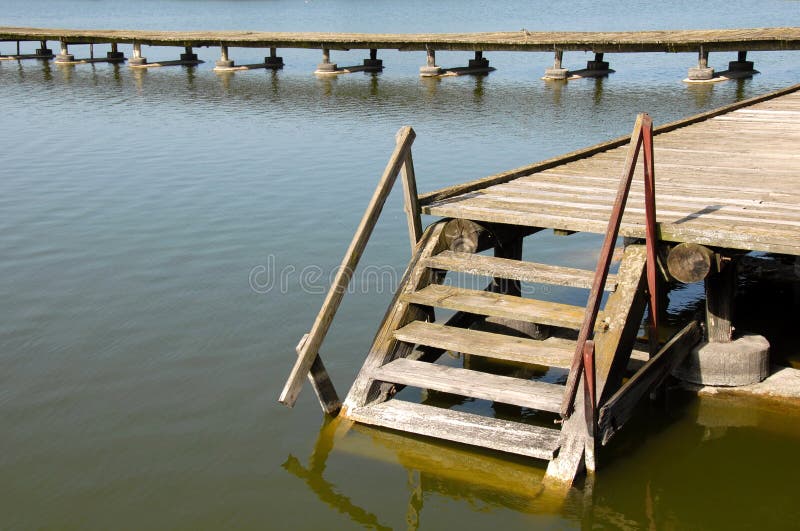 Wooden stairs into water stock photo. Image of outdoor - 15504042