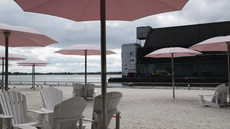 Downtown Beach Park with Pink Colour Umbrellas in Toronto, Canada Stock ...