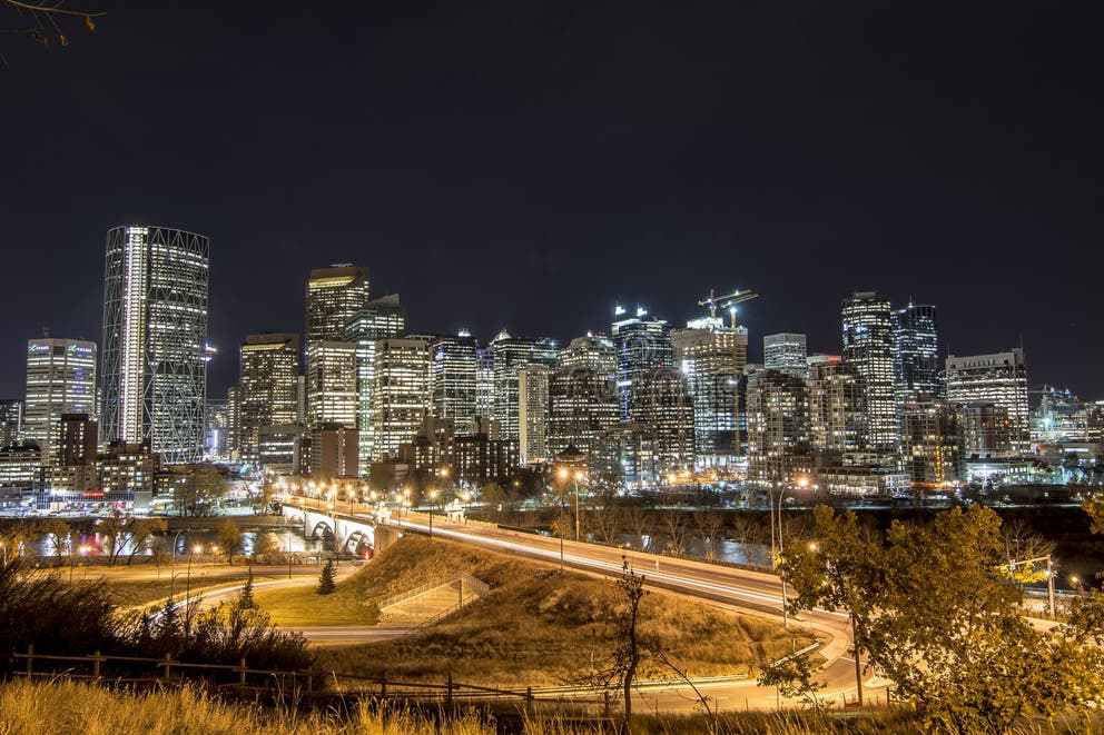 Downtown Calgary at Night editorial stock photo. Image of streaks ...