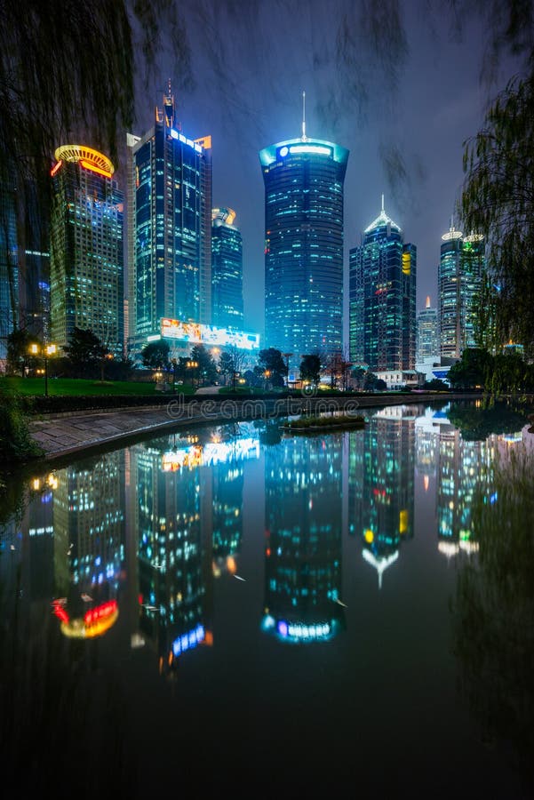 Downtown City Skyline Along the River at Night Stock Photo - Image of ...