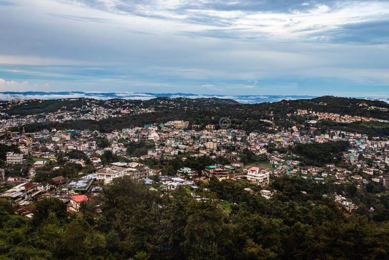 Downtown City View with Dramatic Cloudy Sky at Evening from Mountain ...