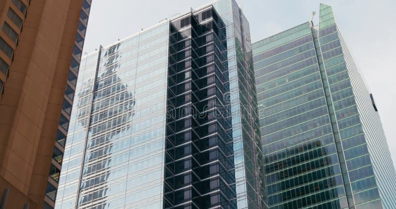 Downtown Skyscrapers: a Mesmerizing View from Below Focusing on Windows ...