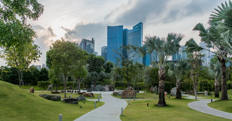 Downtown View from Beautiful Green City Park at Dawn. Stock Photo ...