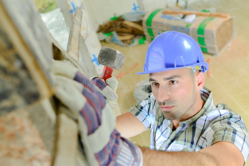 Man holding sledge hammer stock image. Image of handle - 32238879