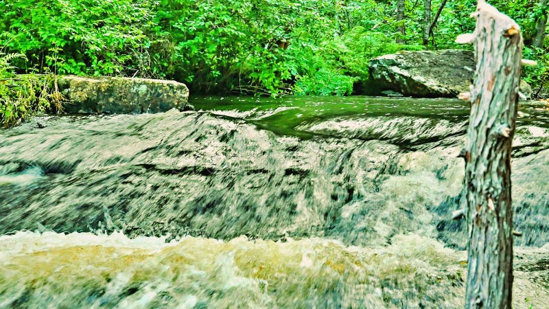A Downward View of a Cascade Stock Image - Image of snow, woodland ...