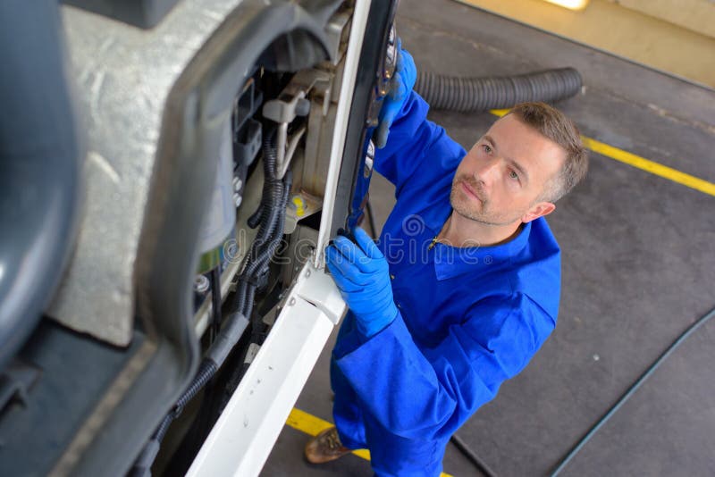 Downward View Mechanic Work Stock Photos - Free & Royalty-Free Stock ...