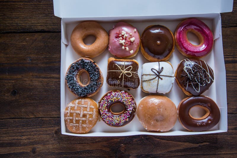 Dozen donuts box stock image. Image of food, dessert, white - 9747177