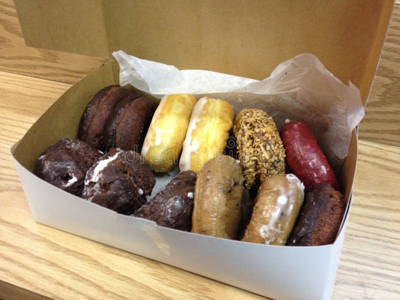 A Dozen Donuts stock image. Image of cream, cake, sweets - 49568649