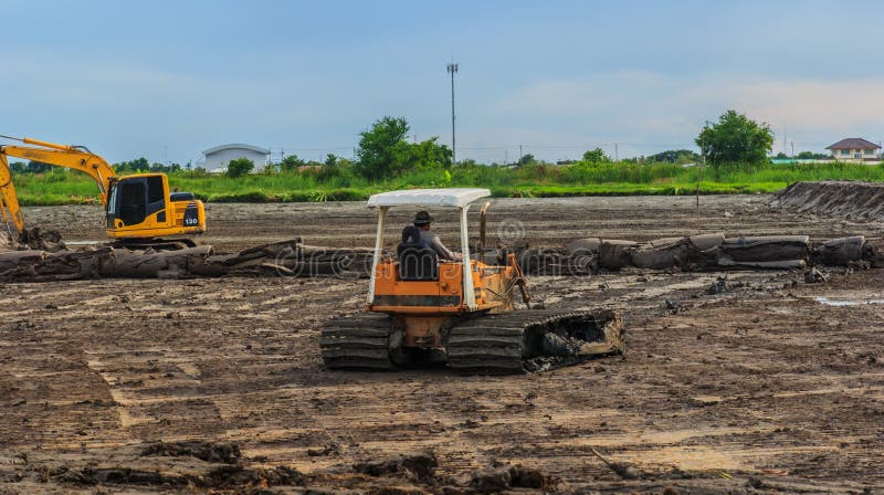Dozer in action editorial stock photo. Image of equipment - 63012518