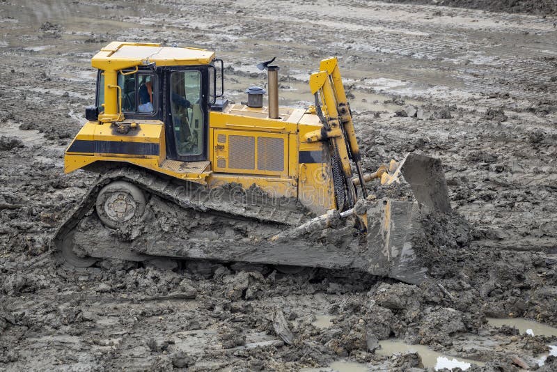 Dozer pushing pile of dirt stock image. Image of outdoor - 152045495