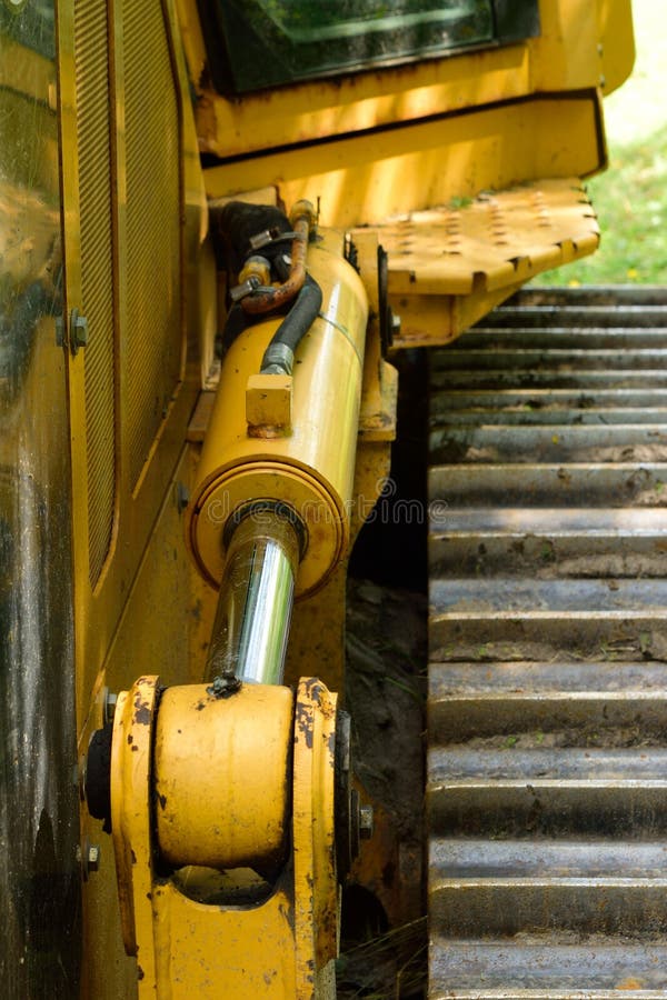 Dozer Tilt Cylinder stock photo. Image of contractor - 59491326