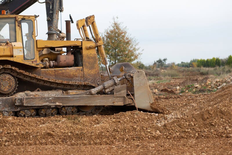 Dozer Working at Construction Site. Bulldozer for Land Clearing ...