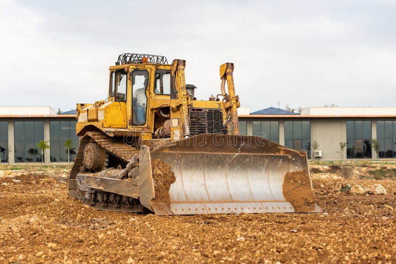 Dozer Working at Construction Site. Bulldozer for Land Clearing ...