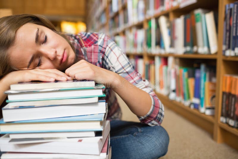 Dozing Student Sitting Library Floor Leaning Pile Books Photos - Free ...