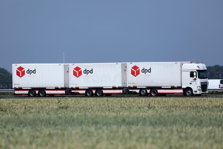 DPD Trucks on highway editorial photography. Image of currier - 125994767