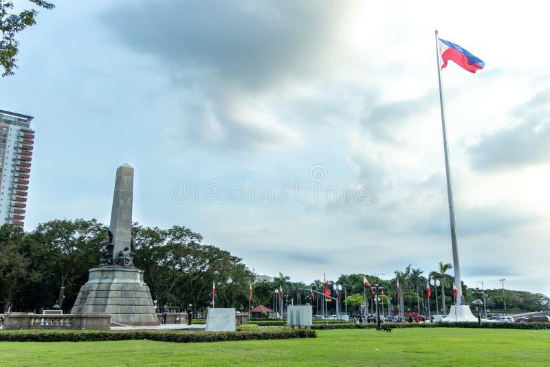 Dr. Jose Rizal National Monument and National Flags in the Wind, Manila ...