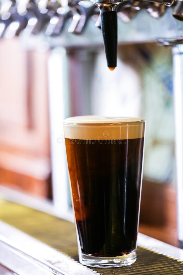 Draft beer stock image. Image of pouring, drink, alcohol - 55085959
