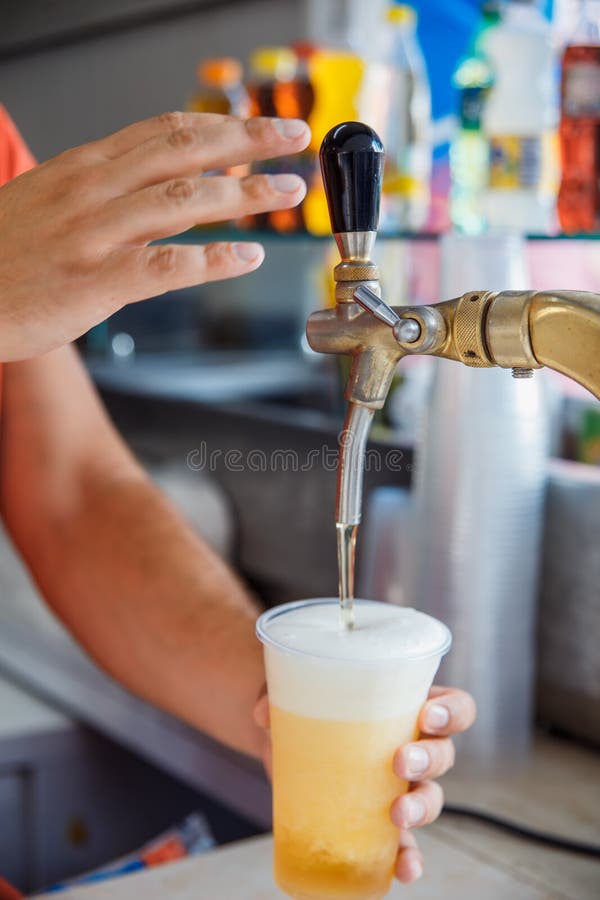 Draft beer pour stock photo. Image of beach, handles - 76780972