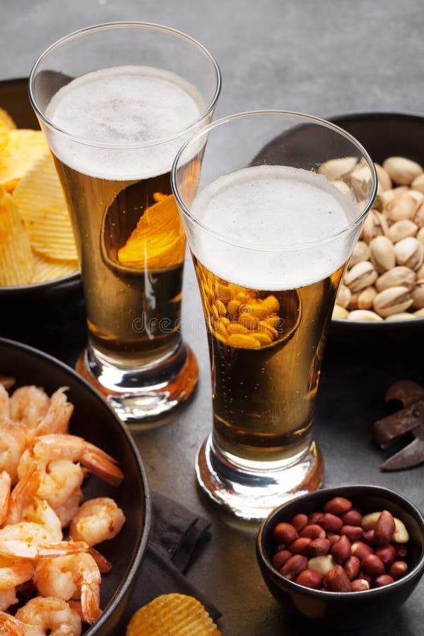Draft beer and snacks stock image. Image of oktoberfest - 157512517