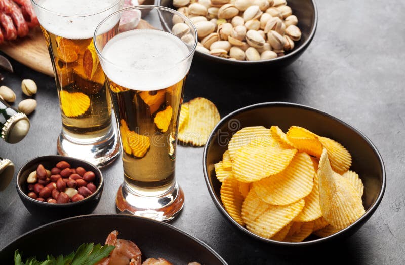 Draft beer and snacks stock photo. Image of sausage - 164255248