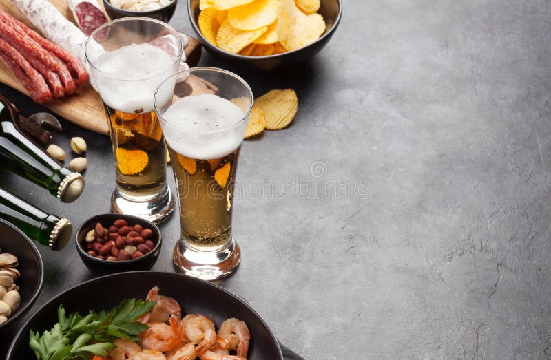 Draft beer and snacks stock image. Image of drink, board - 159375517