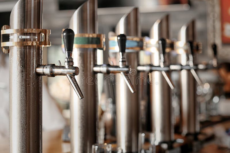 Draft Beer Taps in Modern Bar Stock Image - Image of sort, light: 150082755