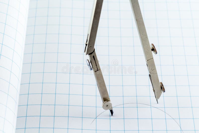 Drafting Compass on Checkered Background Stock Photo - Image of metal ...