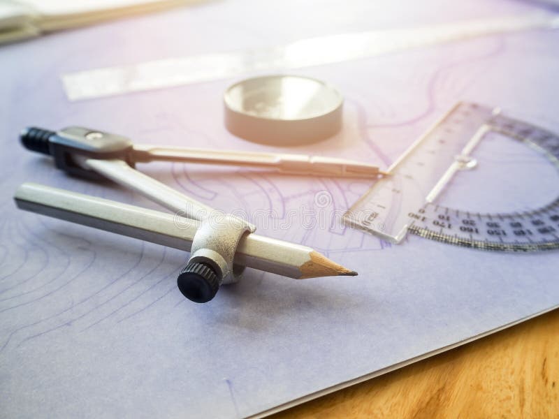 Drafting Compass and Rulers on Blueprints. Stock Photo - Image of ...