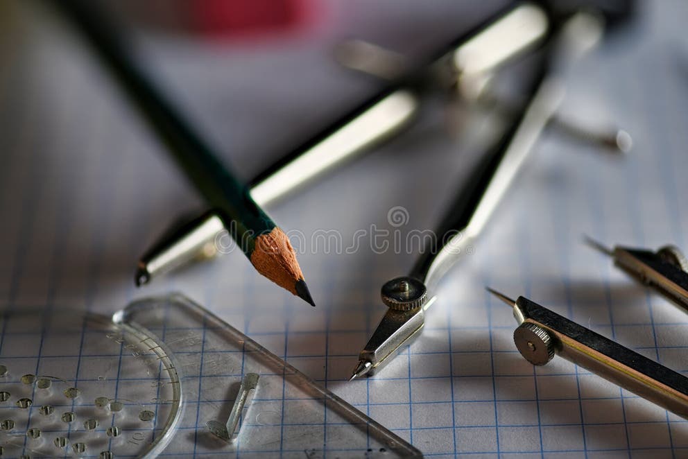 Drafting Tools on Grid Paper Close Up Stock Image - Image of tool ...