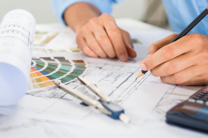 Draftsman Drawing Blueprints Stock Image - Image of drawing ...