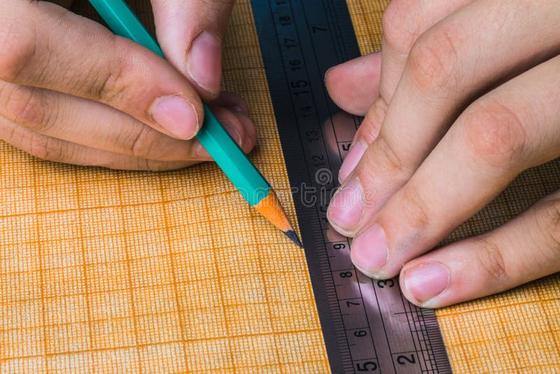 Draftsman draws on a ruler stock image. Image of maths - 41126933