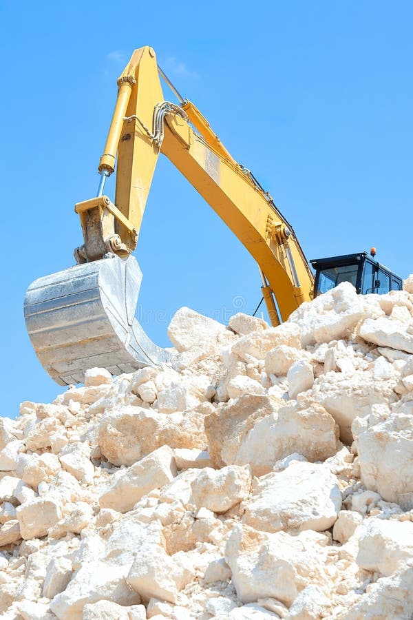 Dragline Excavator Working on Construction Site with Large Rocks Under ...