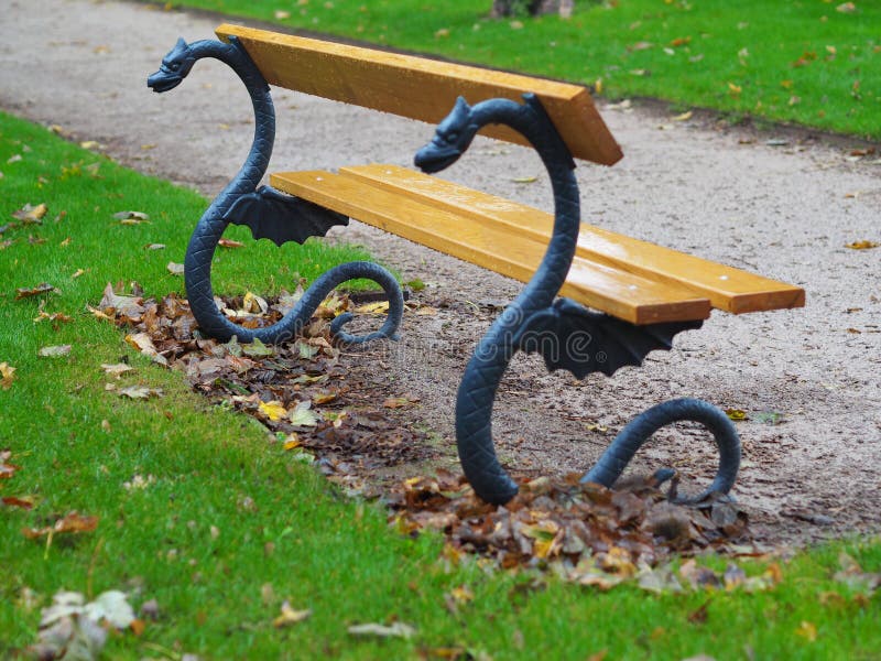 Dragon Bench in Park during Autumn Stock Image - Image of park, walk ...