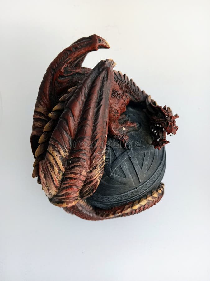 Curled up dragon figure stock image. Image of dragon - 114655313