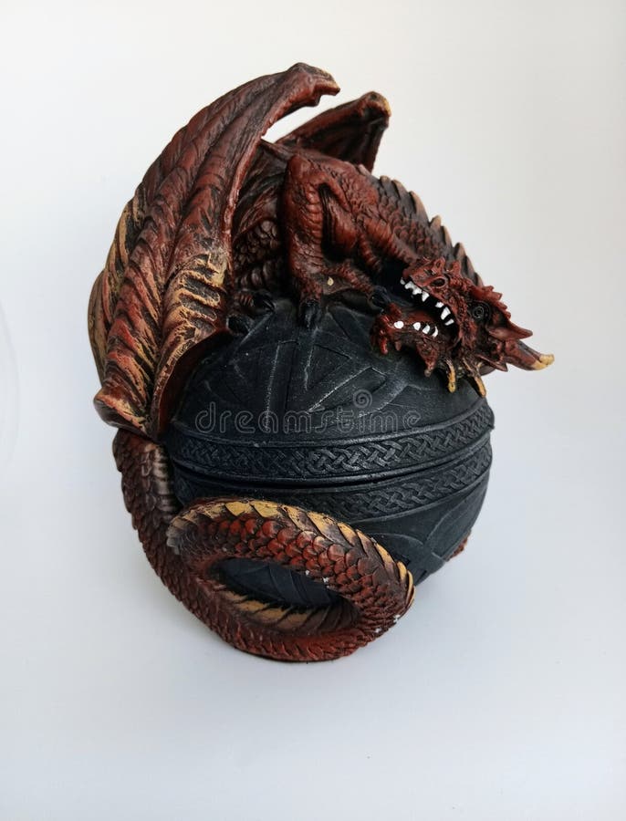 Curled up dragon figure stock image. Image of dragon - 114655313