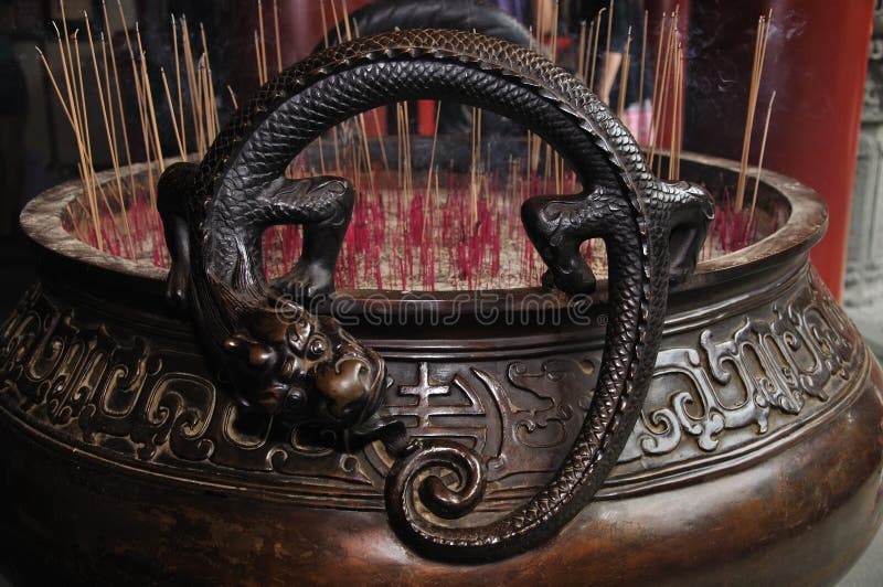 Dragon on incense burner. stock image. Image of craft - 23633065
