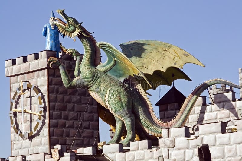 Dragon and Merlin stock photo. Image of clock, fairylike - 4373838