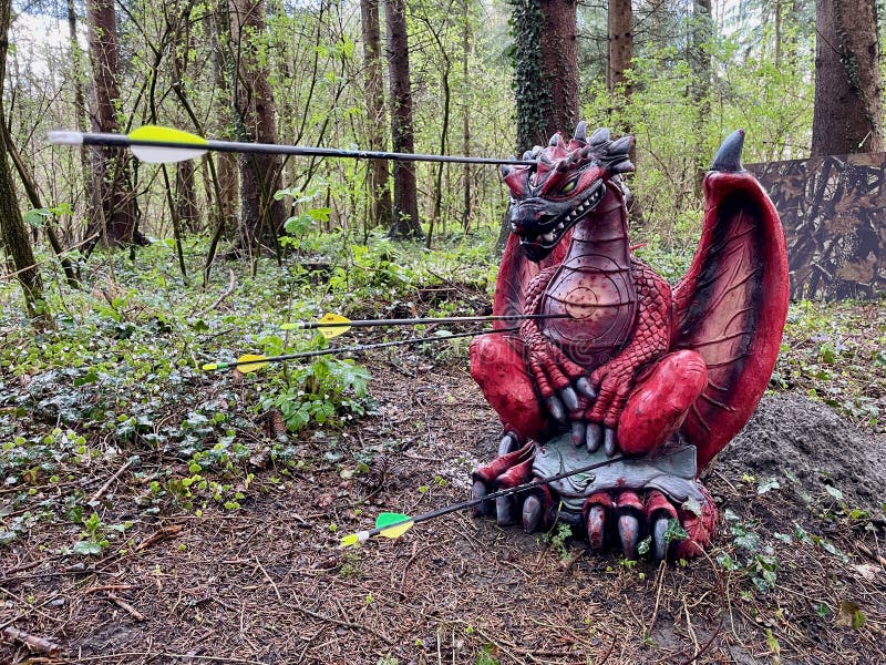 A Dragon Practice Target for Bow and Arrow in the Forest. Stock Photo ...
