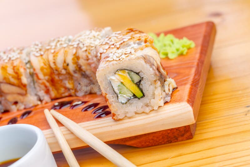 Dragon roll with ell stock image. Image of seaweed, lunch - 61465819
