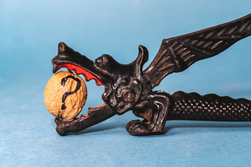 Dragon Shaped Nutcracker with a Nut in Its Teeth Stock Photo - Image of ...