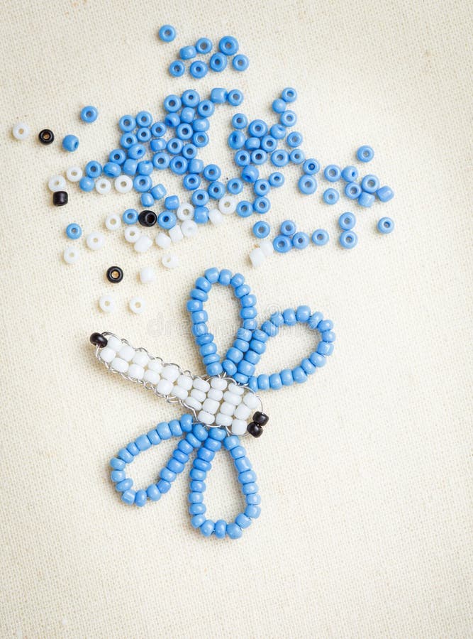 Dragonfly Bead and beads stock photo. Image of handful - 60528238