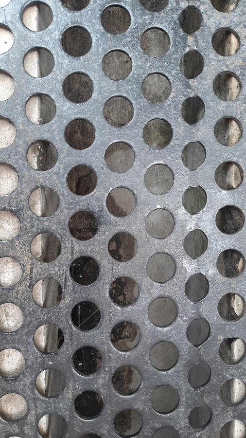 The Drain Hole is Closed with an Iron Cap with a Pattern of Dotted ...