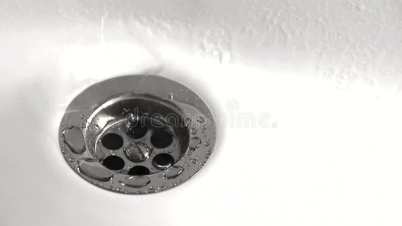Drain hole in the sink stock footage. Video of house - 225485404