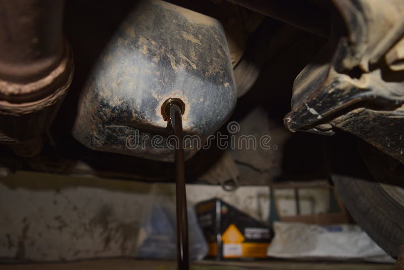 Drain the Old Oil from the Engine through the Drain Plug Stock Image ...