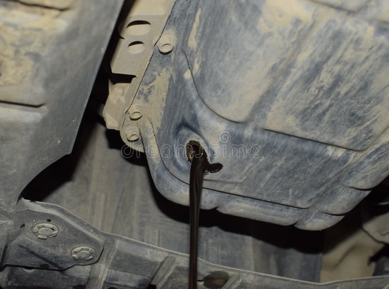 Drain the Old Oil from the Engine through the Drain Plug Stock Image ...