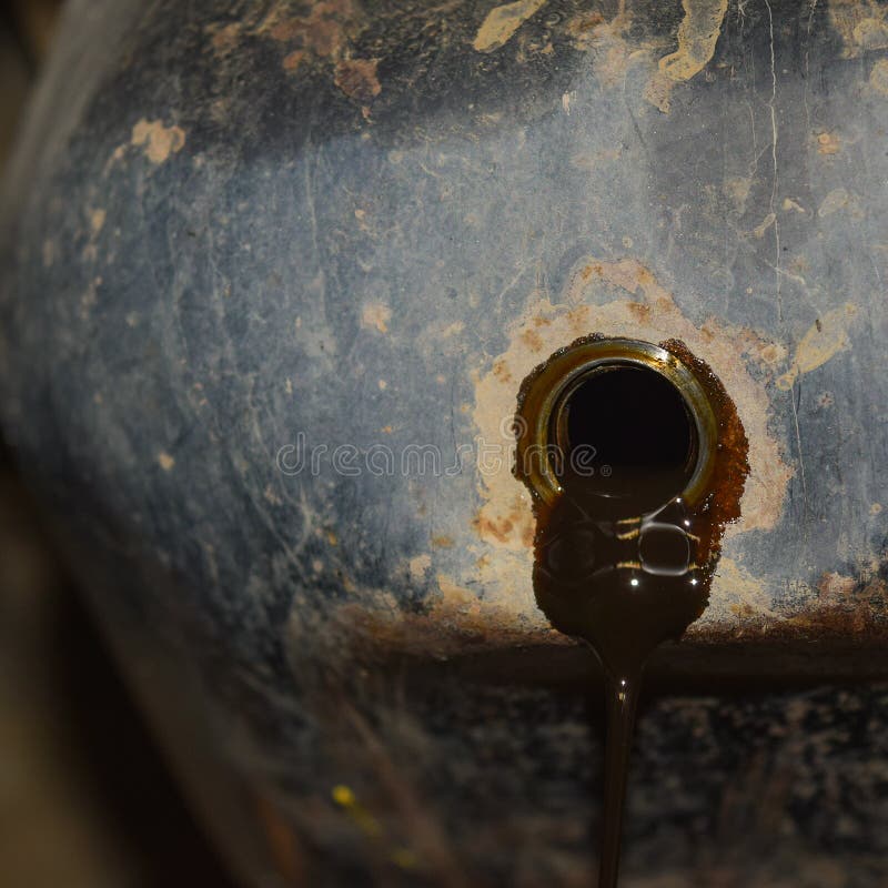 Drain the Old Oil from the Engine through the Drain Plug Stock Photo ...