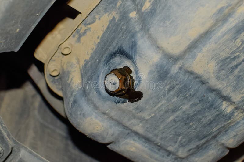 Drain the Old Oil from the Engine through the Drain Plug Stock Image ...