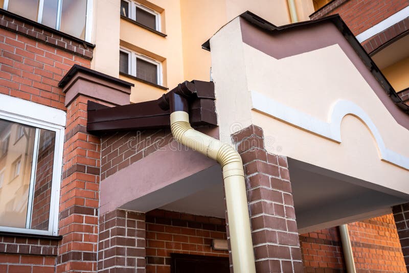 Drain Pipe on the Brown Brick Wall. Downspout Stock Image - Image of ...